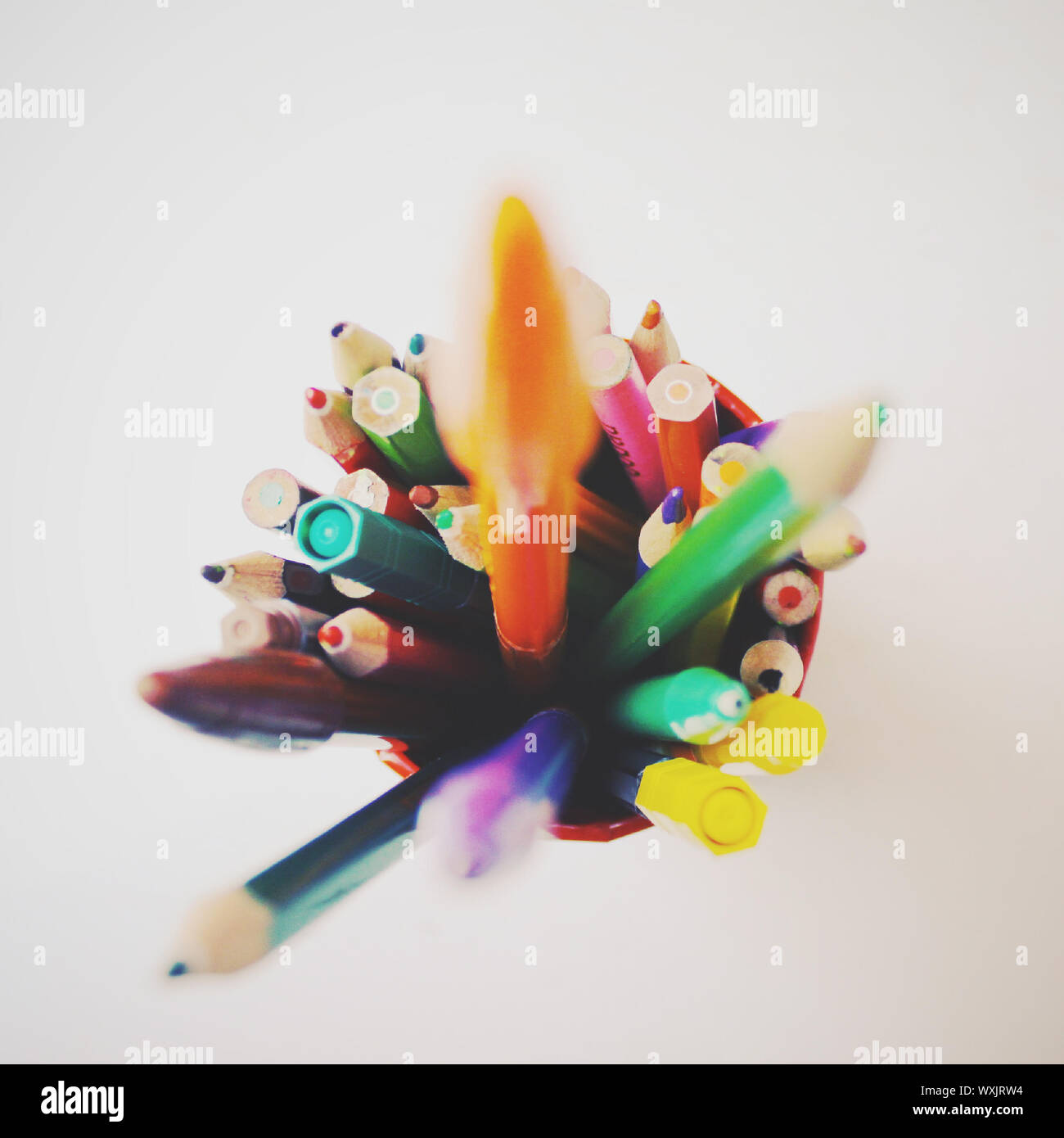 Group of crayons and pens with retro filter effect Stock Photo - Alamy
