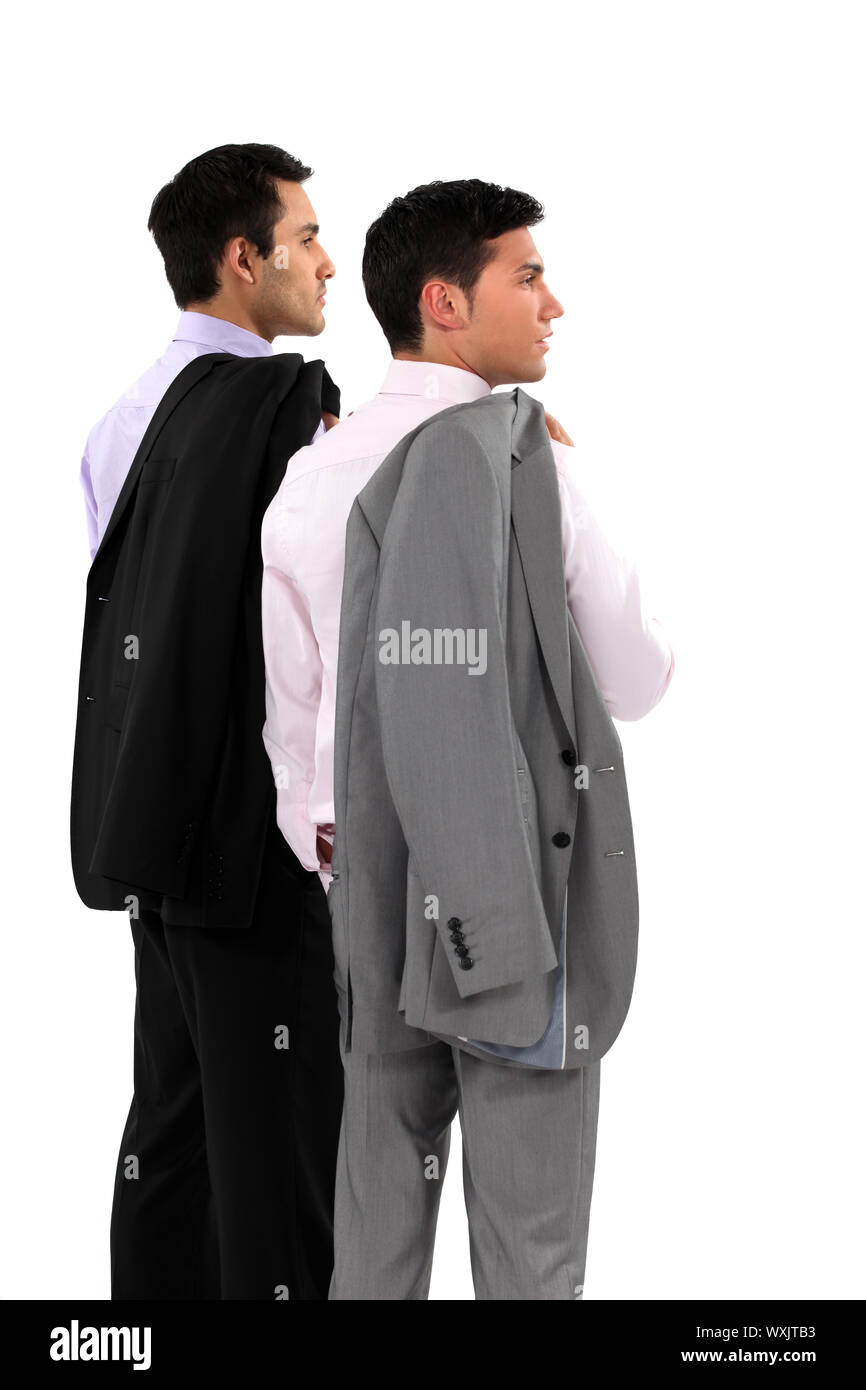 Two businessmen with their jackets over their shoulders Stock Photo - Alamy