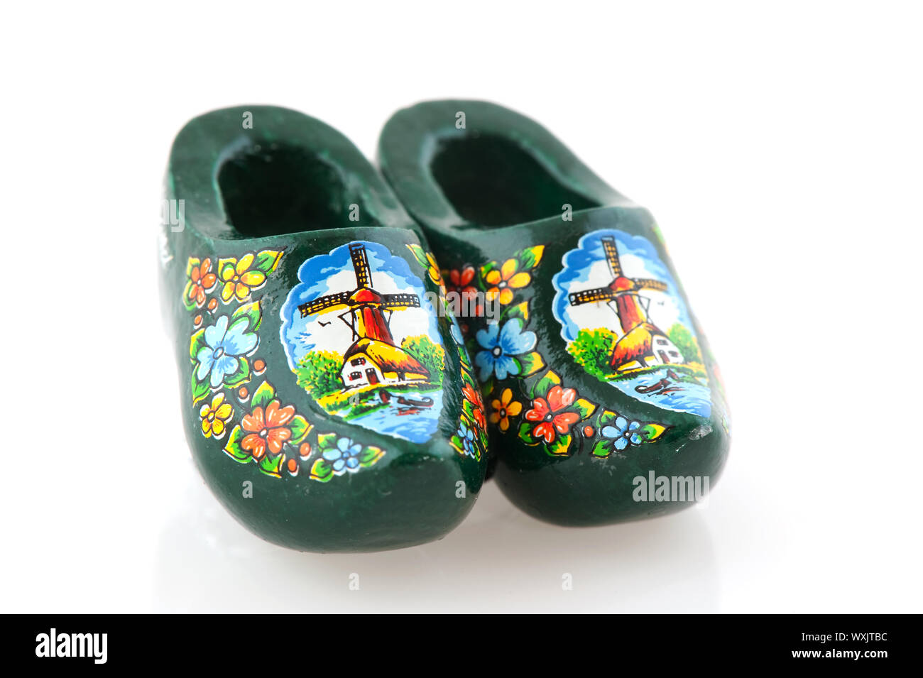 Typical Dutch wooden clogs on white background Stock Photo - Alamy