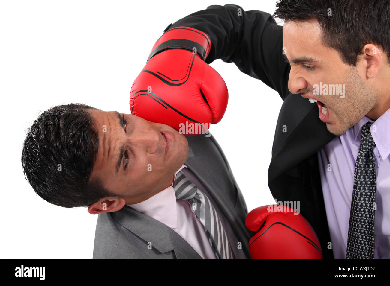 Two businessmen boxing Stock Photo - Alamy