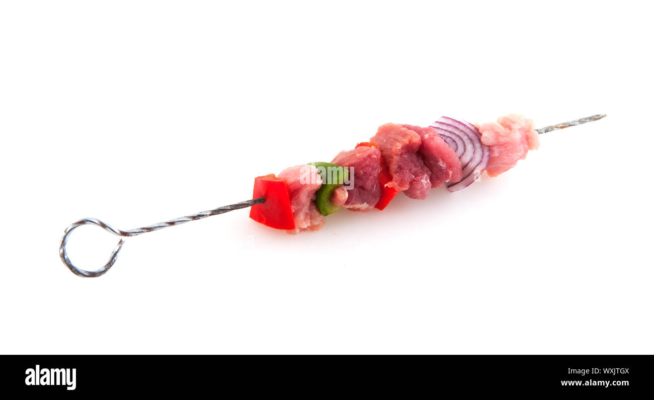 Pig meat pins with vegetables for roasting on the barbecue Stock Photo ...