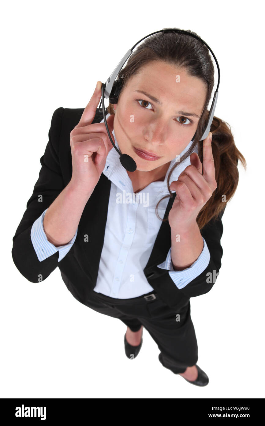 Call-center worker wearing head-set Stock Photo - Alamy