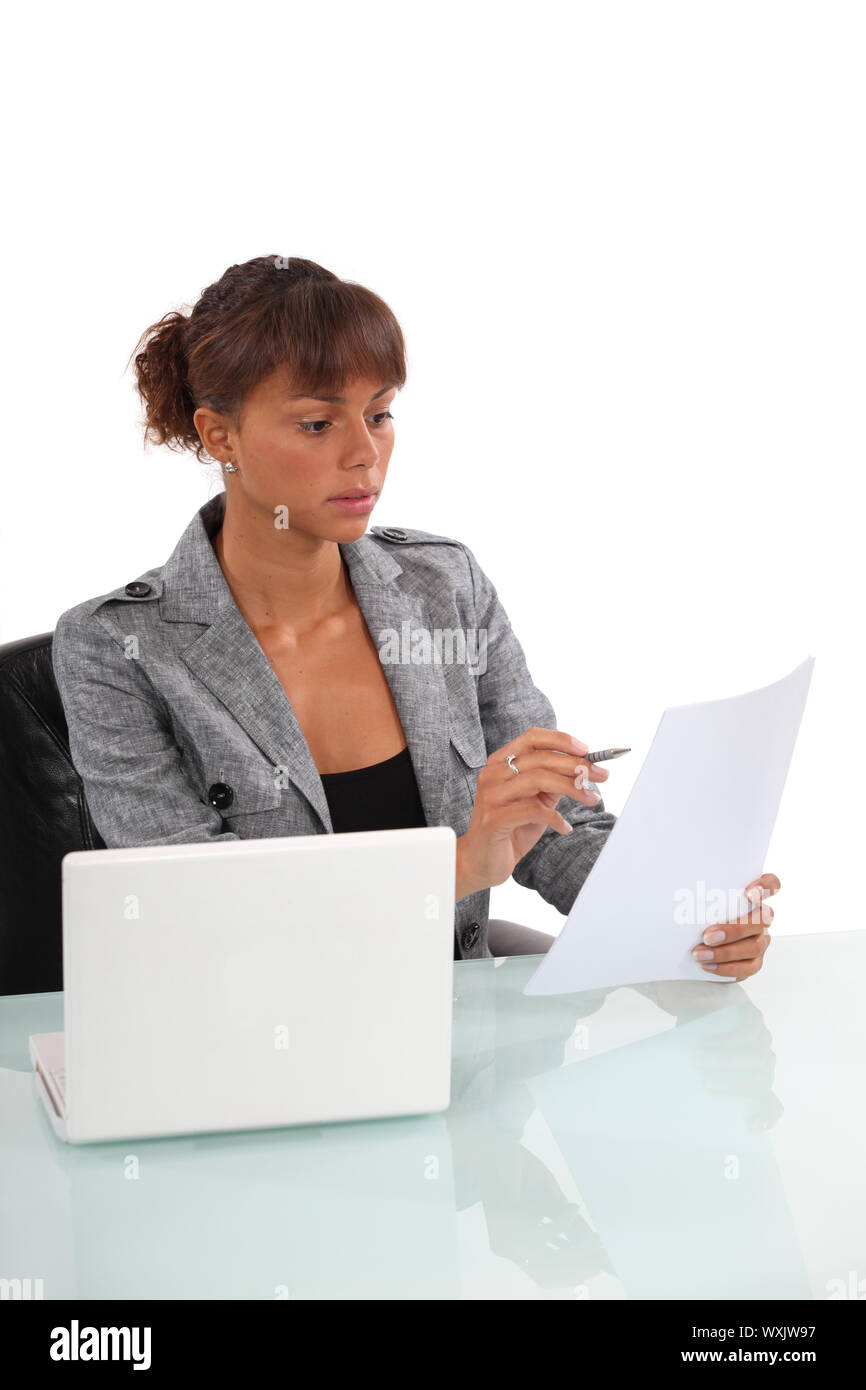 Office worker sat at desk Stock Photo - Alamy
