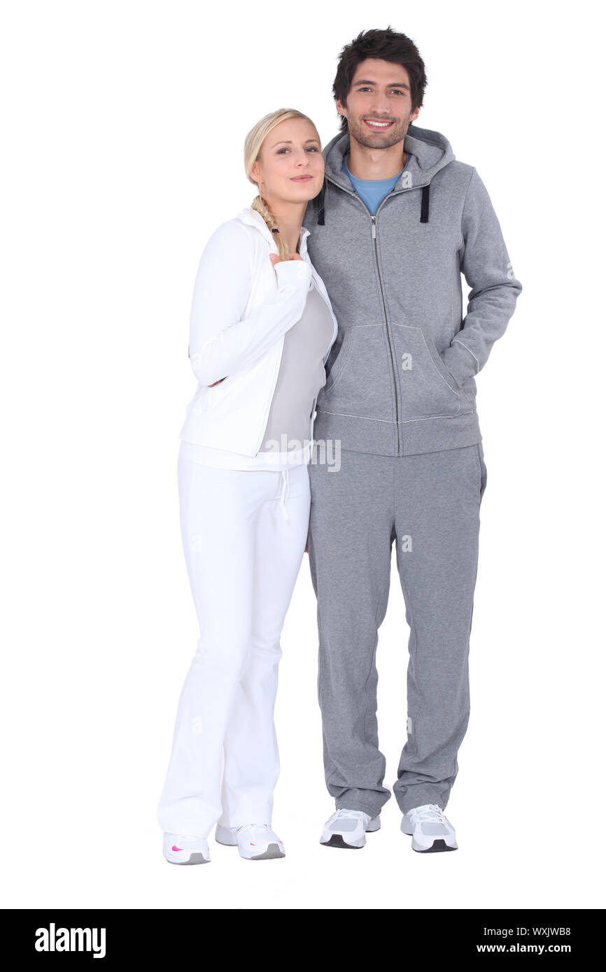 a couple wearing sport suits Stock Photo - Alamy
