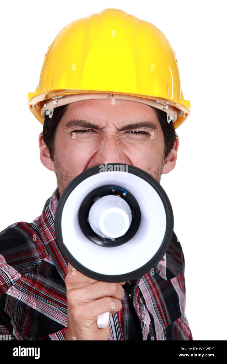 A construction worker calling a strike Stock Photo - Alamy