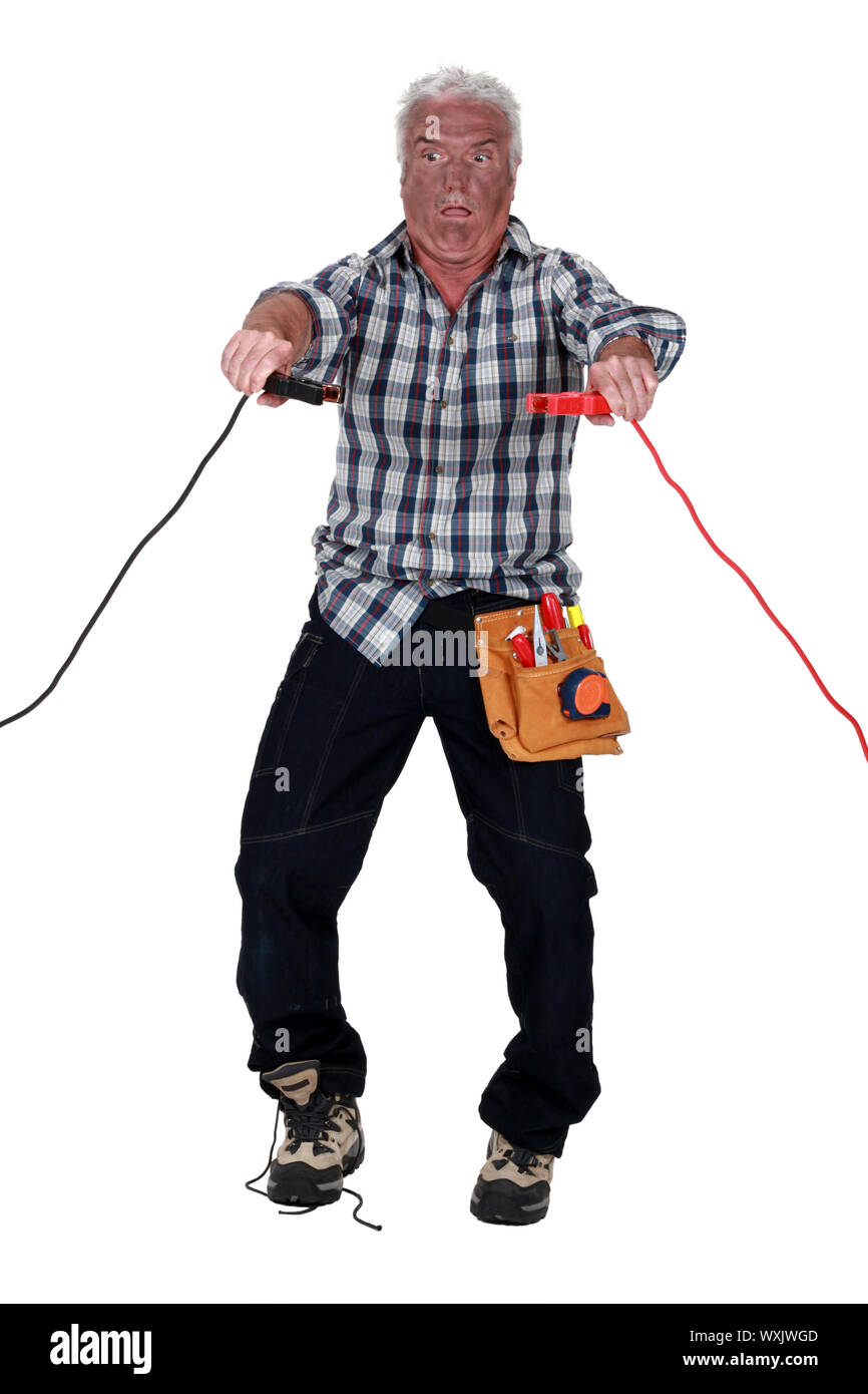 A shocked electrician Stock Photo - Alamy