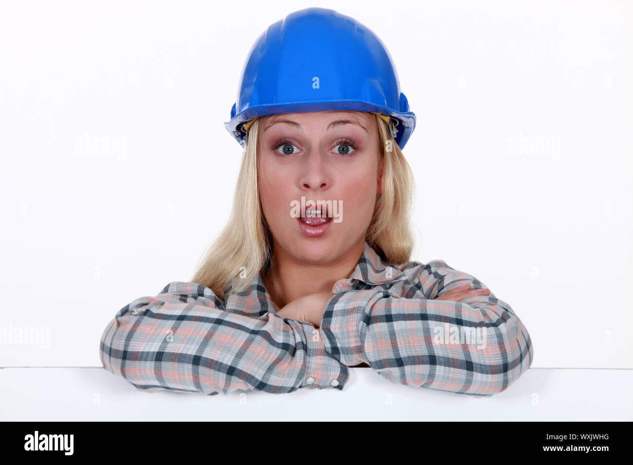 A surprised construction worker Stock Photo - Alamy