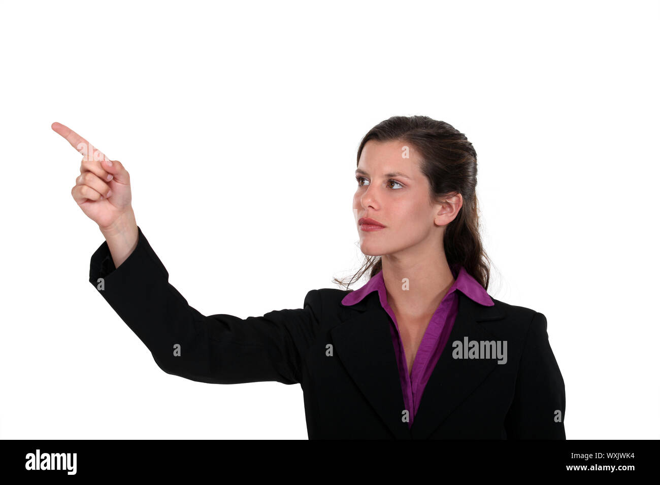 Professional pointing her index finger Stock Photo - Alamy