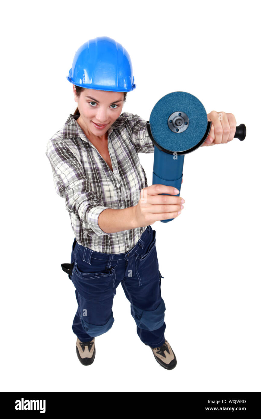 Woman holding angle-grinder Stock Photo - Alamy