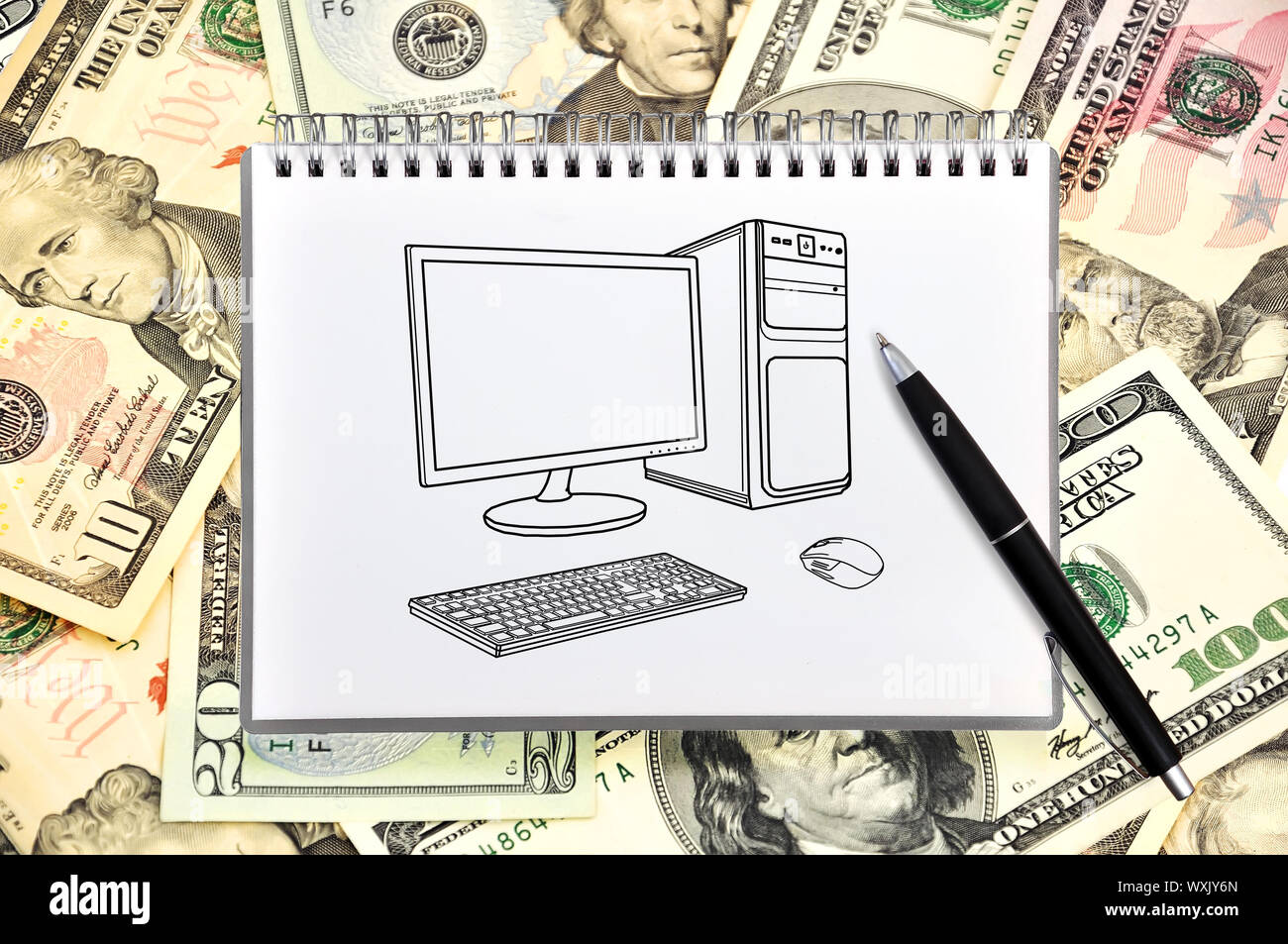 notebook with drawing computer on money background Stock Photo - Alamy