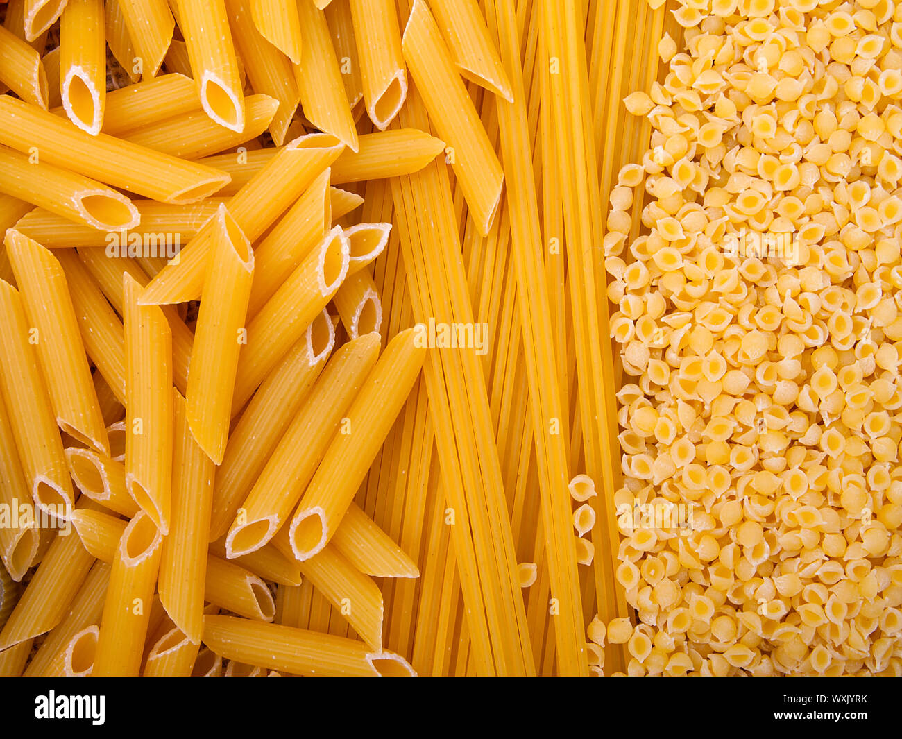 Variety of types and shapes of Italian pasta. Dry pasta background ...