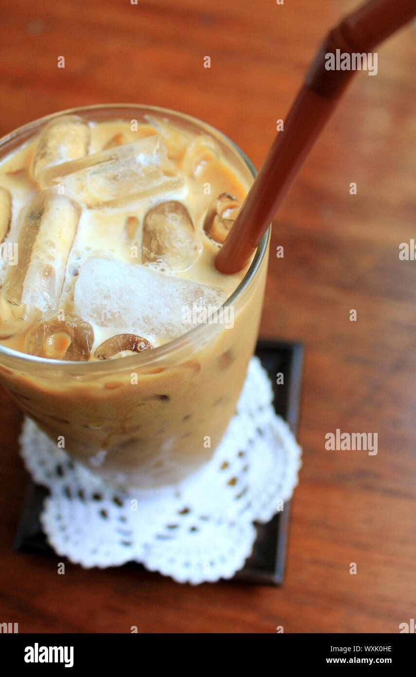 Iced coffee with straw Stock Photo - Alamy