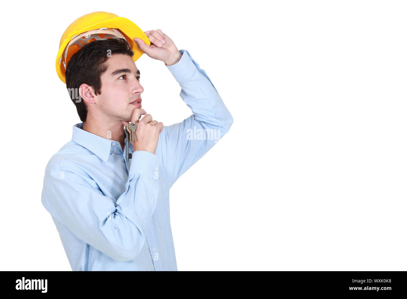 Young architect thinking Stock Photo - Alamy