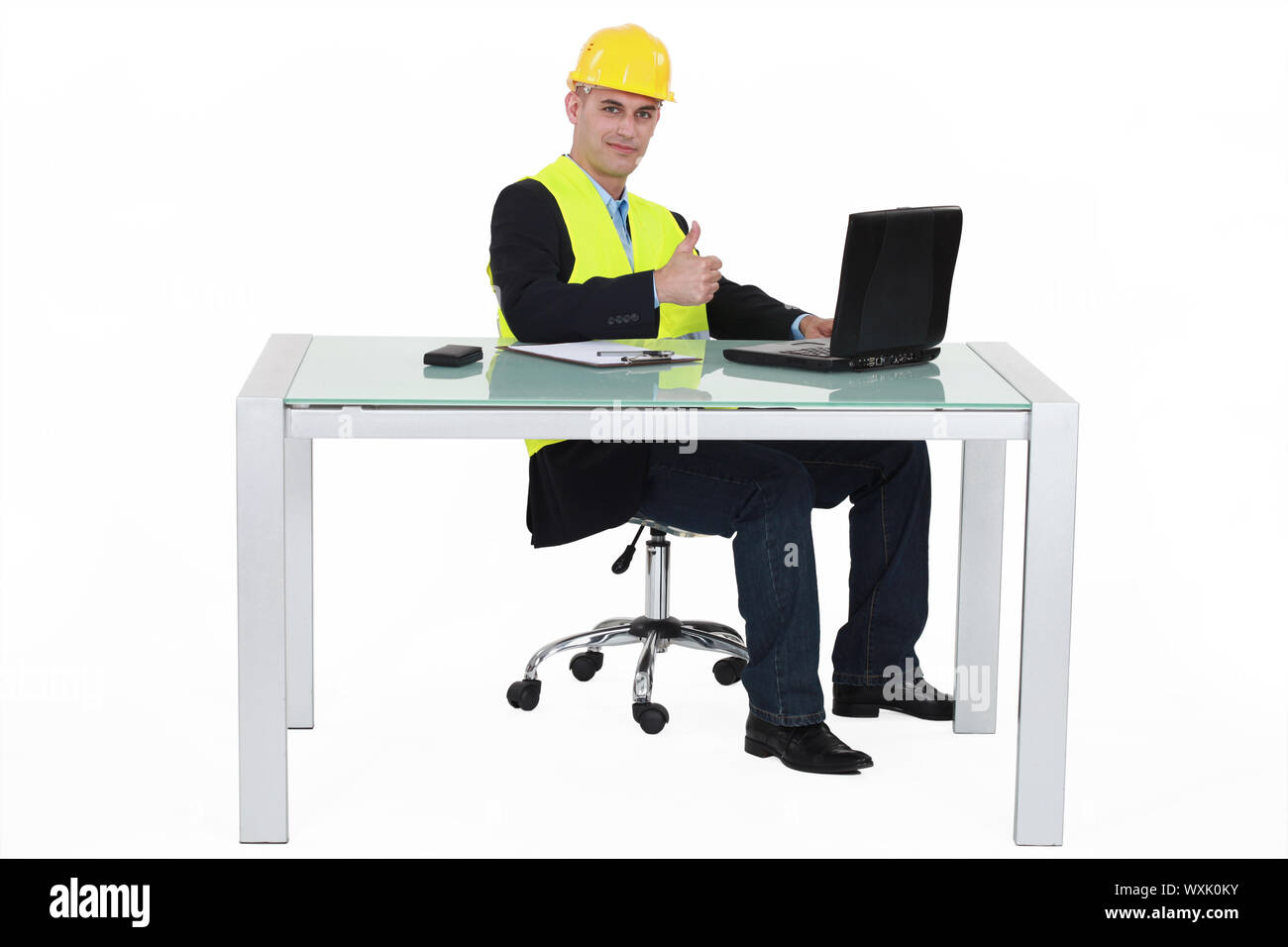 Architect sitting with computer Stock Photo - Alamy