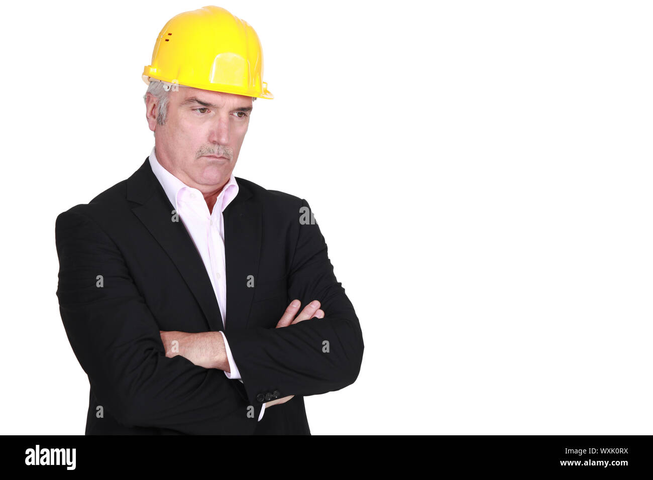 Serious looking architect Stock Photo - Alamy