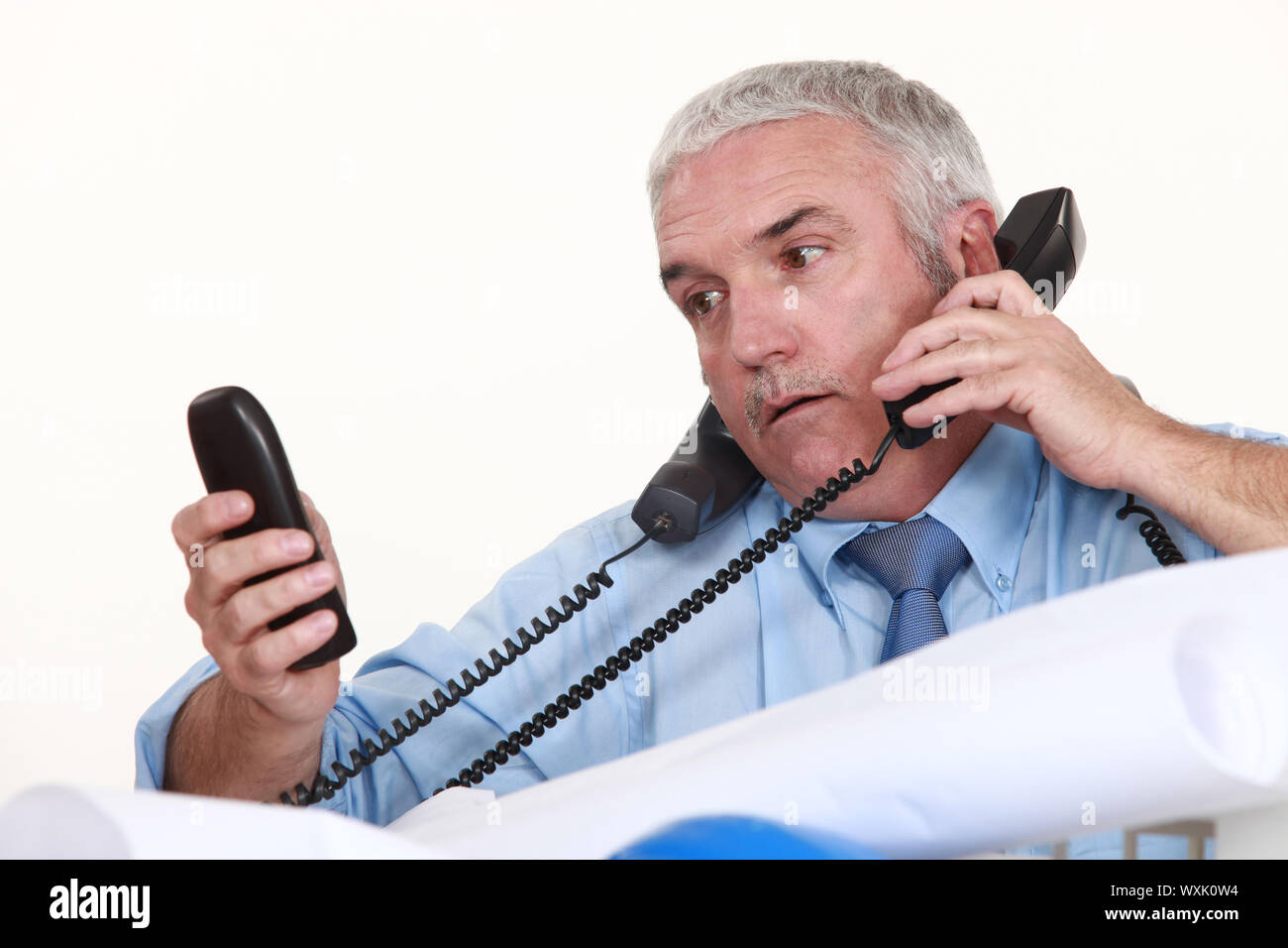 senior architect getting multiple calls Stock Photo - Alamy senior architect getting multiple calls Stock Photo - Alamy