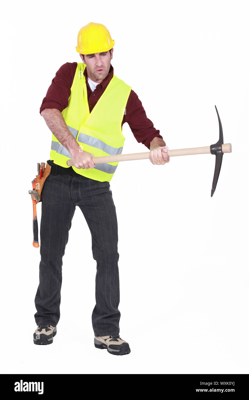 Man wielding axe Stock Photo - Alamy