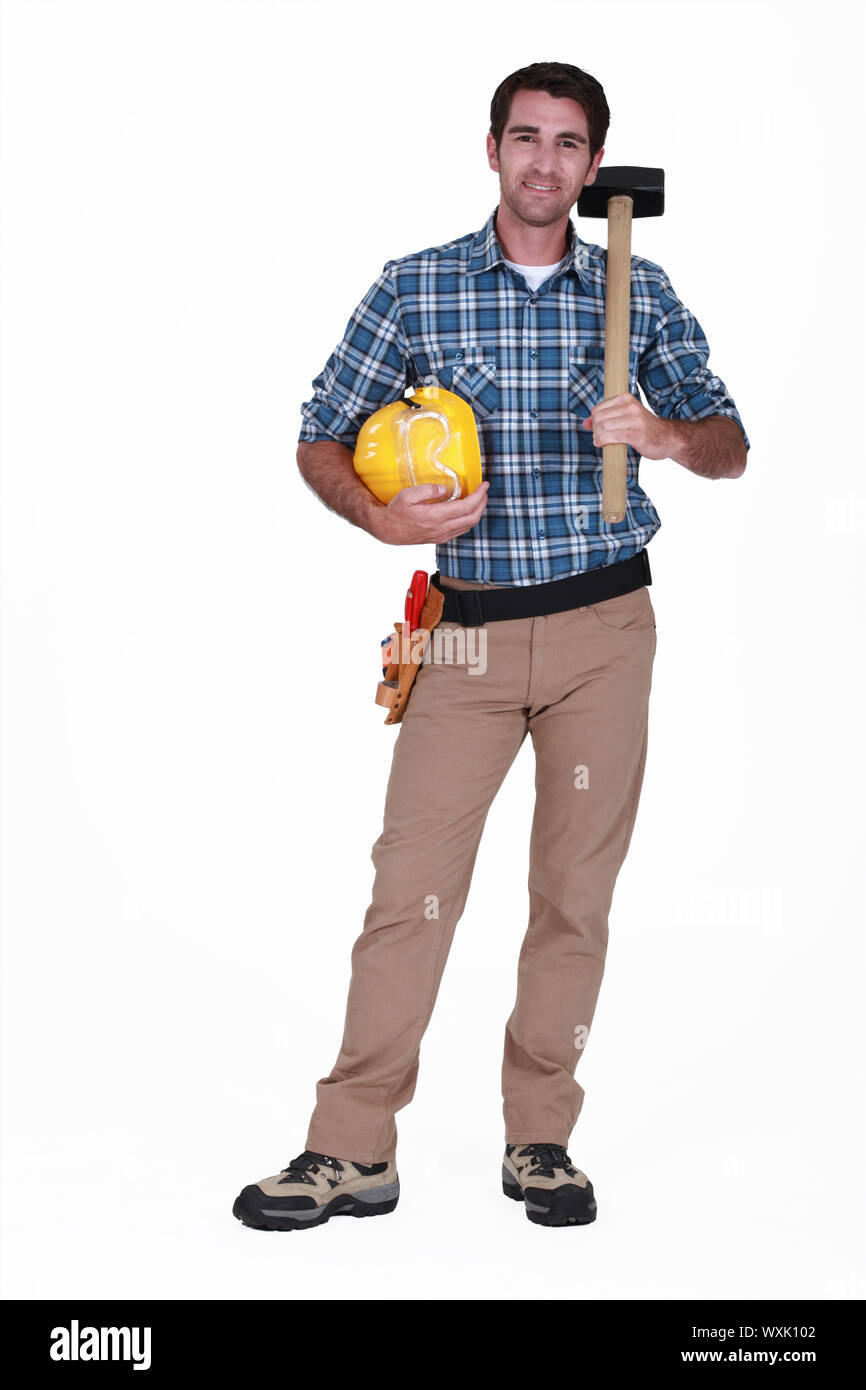 craftsman holding a huge hammer Stock Photo - Alamy