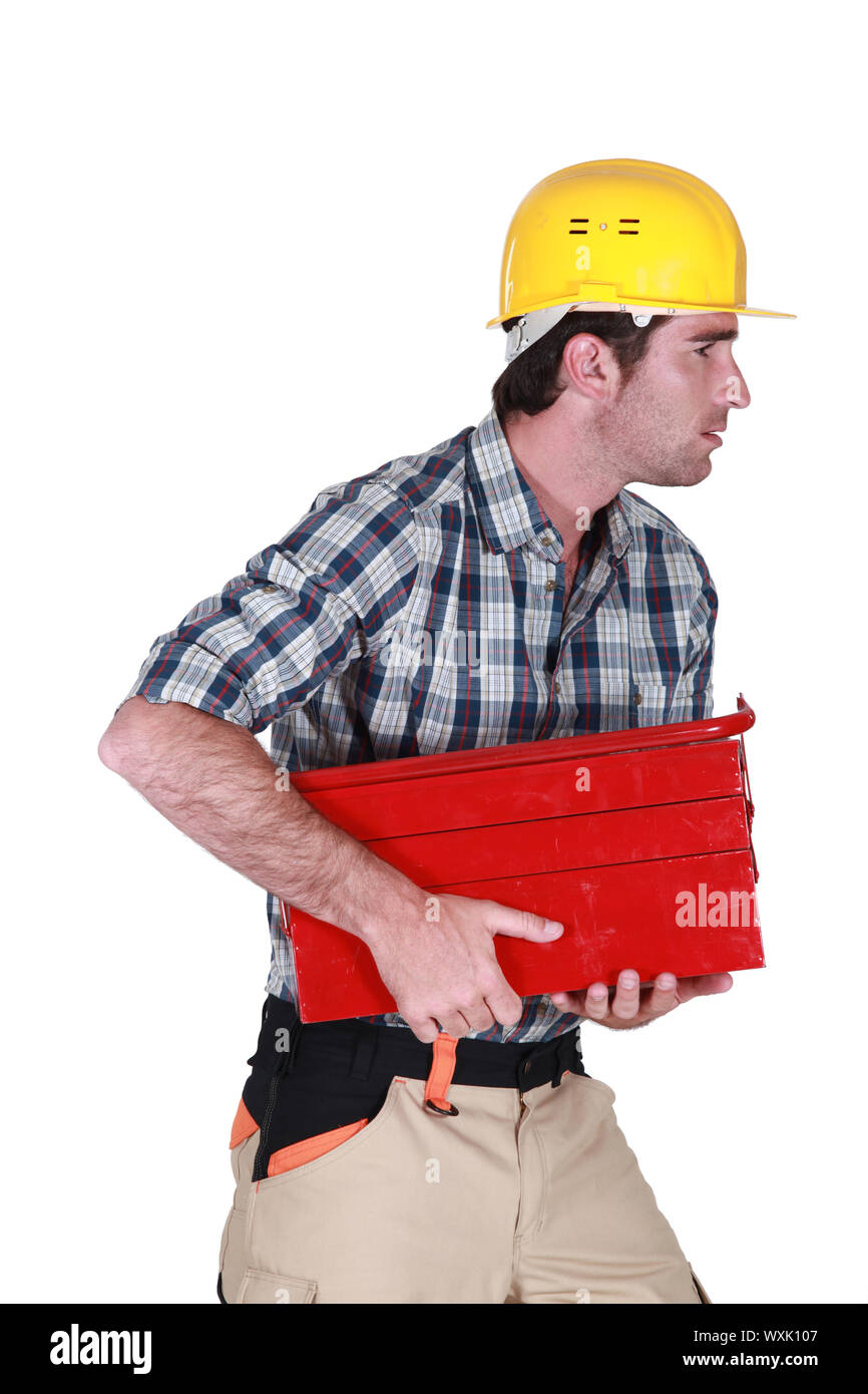 Man running off with tool box Stock Photo - Alamy
