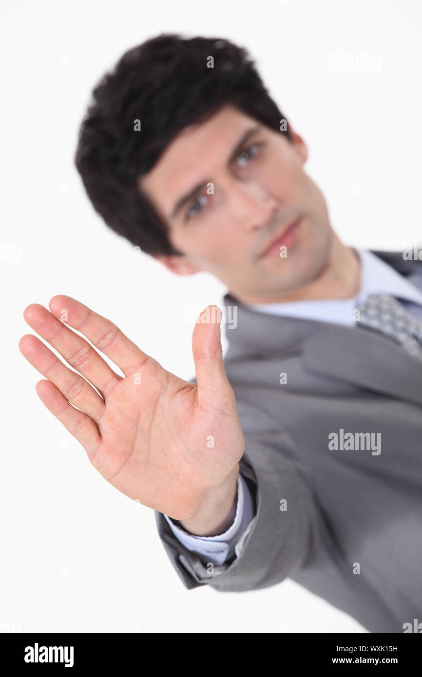 businessman making a stop sign with his hand Stock Photo - Alamy