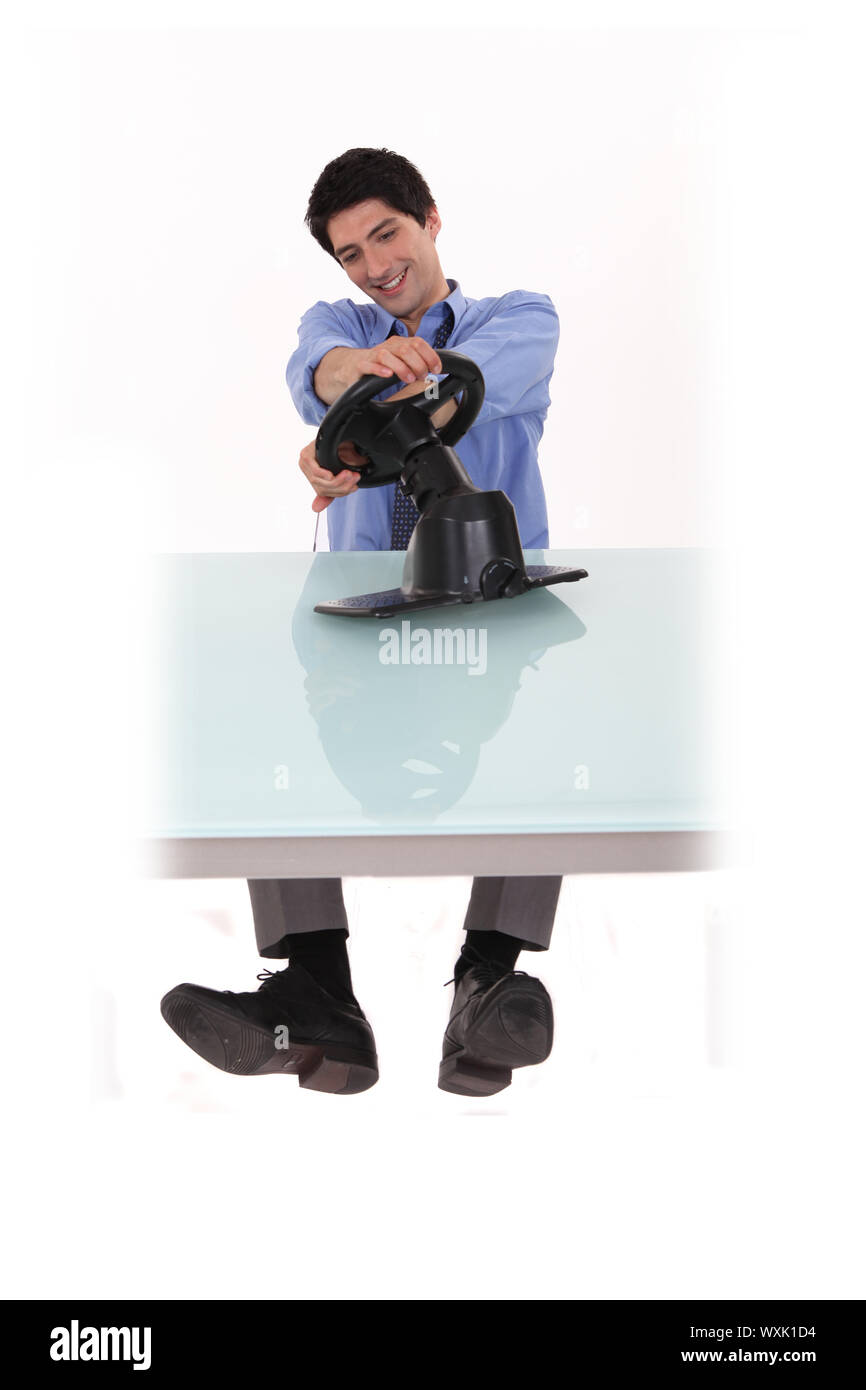 man testing a car driving simulator Stock Photo - Alamy