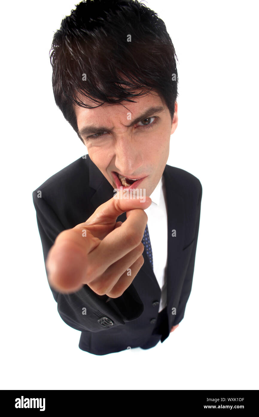 Angry businessman pointing Stock Photo - Alamy