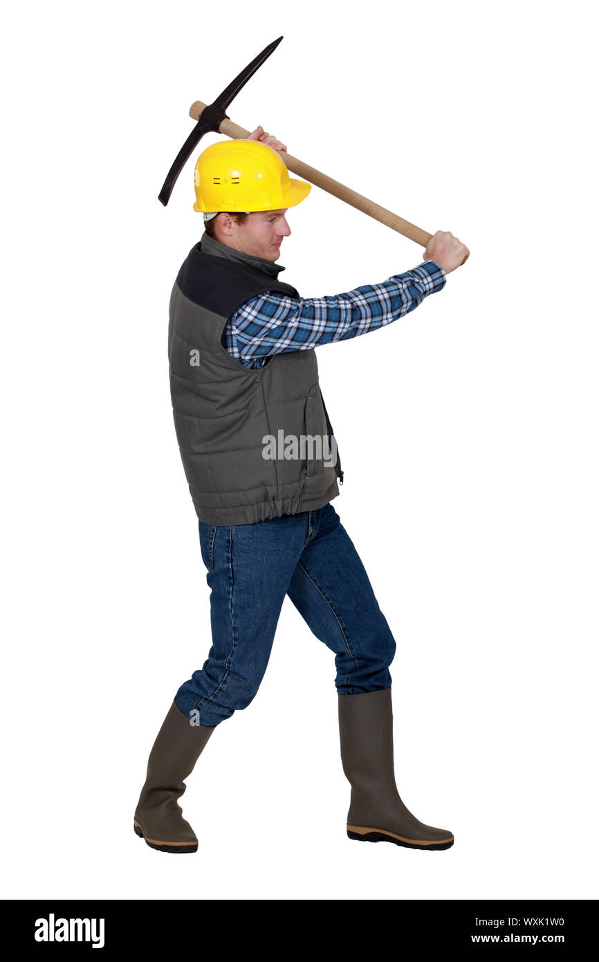 craftsman working with a pick Stock Photo - Alamy