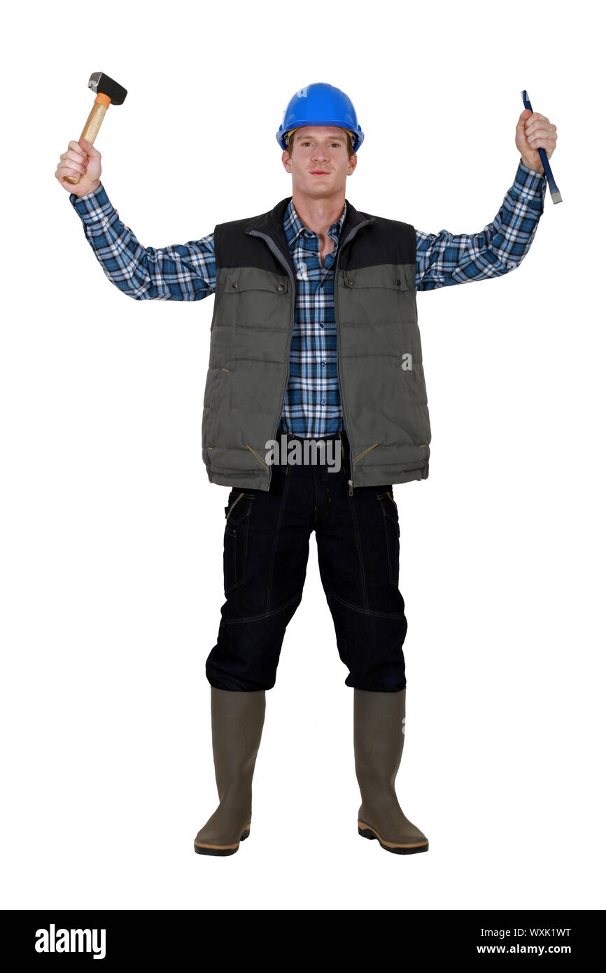 Laborer standing on white background Stock Photo - Alamy