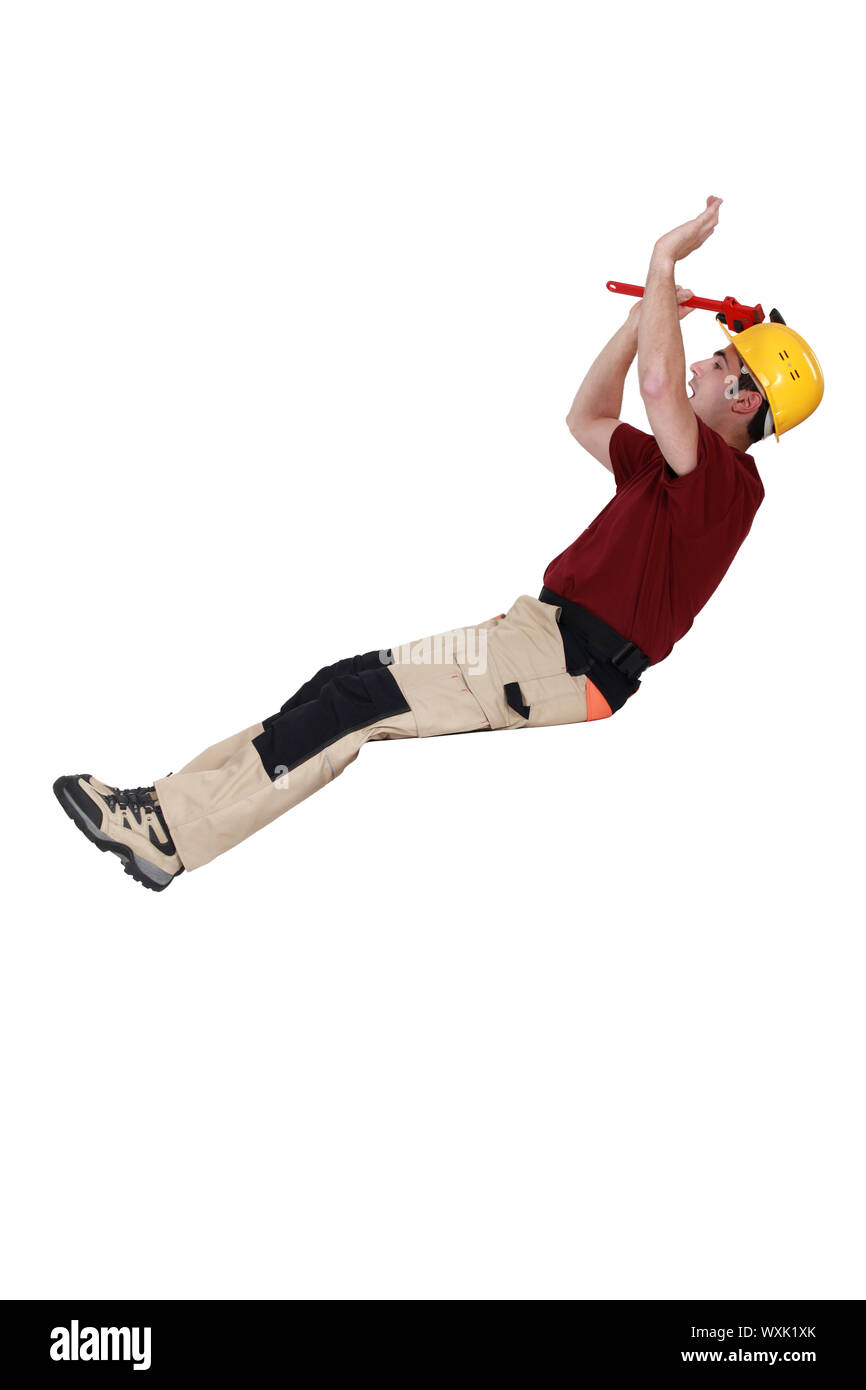 Horizontal image builder of builder balancing Stock Photo - Alamy