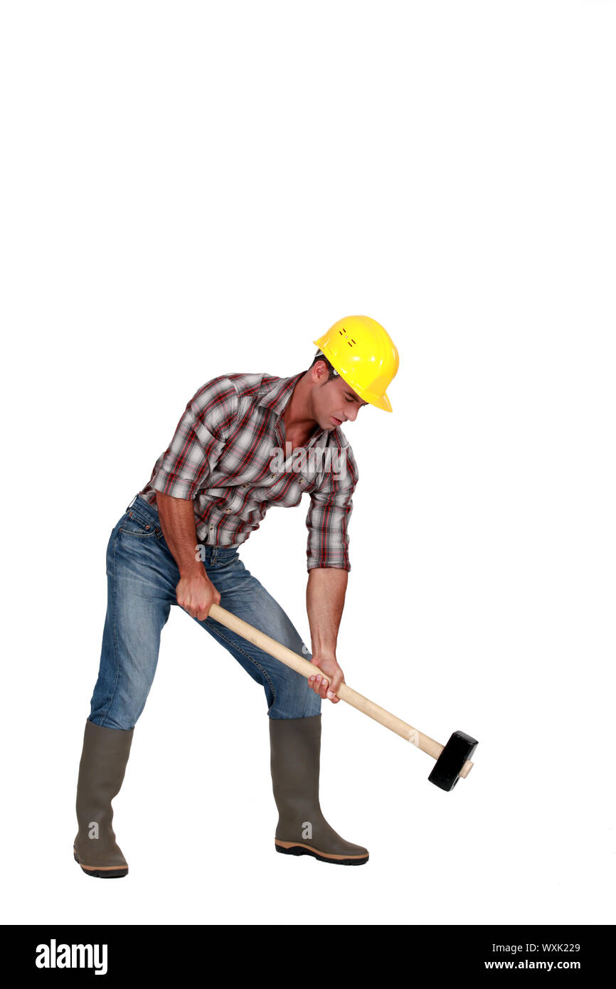 Hard labour breaking rocks hi-res stock photography and images - Alamy