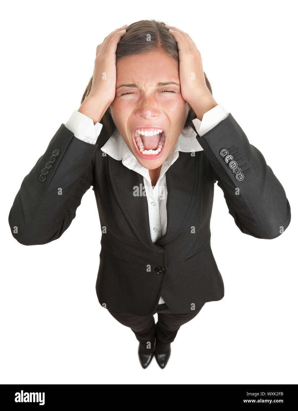 Girl head in hands crying Cut Out Stock Images & Pictures - Alamy