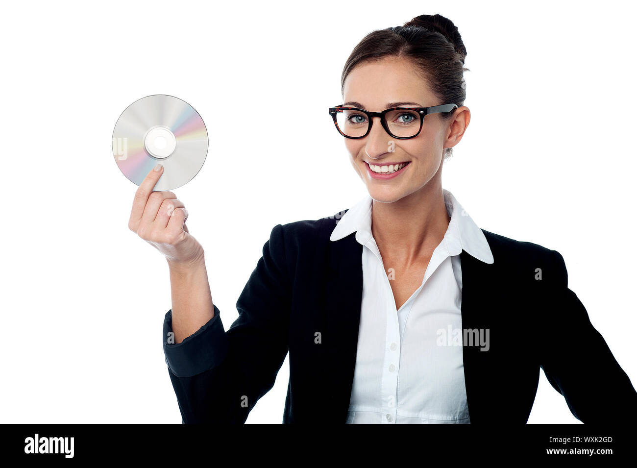 Smiling corporate business lady holding CD Stock Photo - Alamy