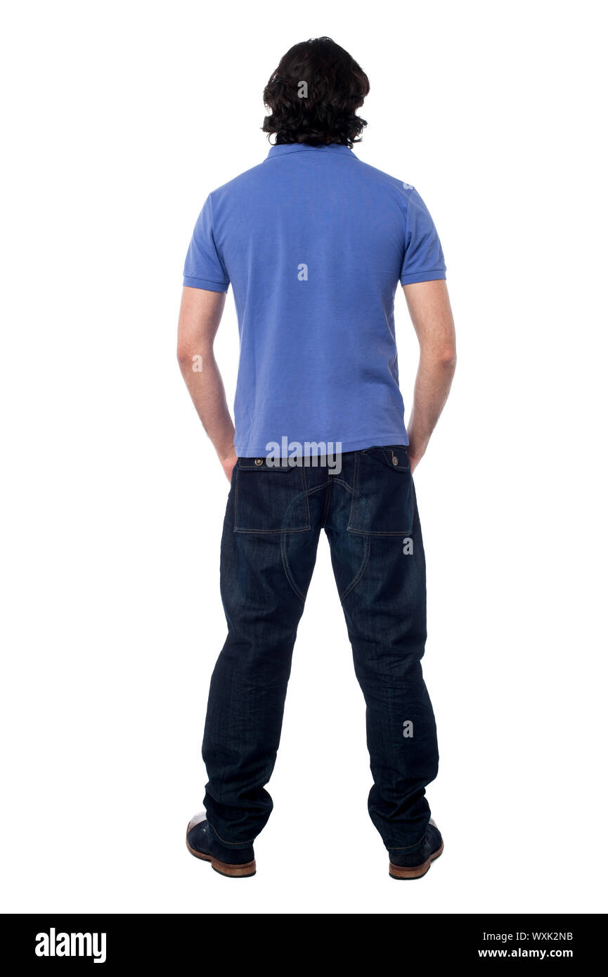 Rear view of a casual young guy, full length shot Stock Photo - Alamy