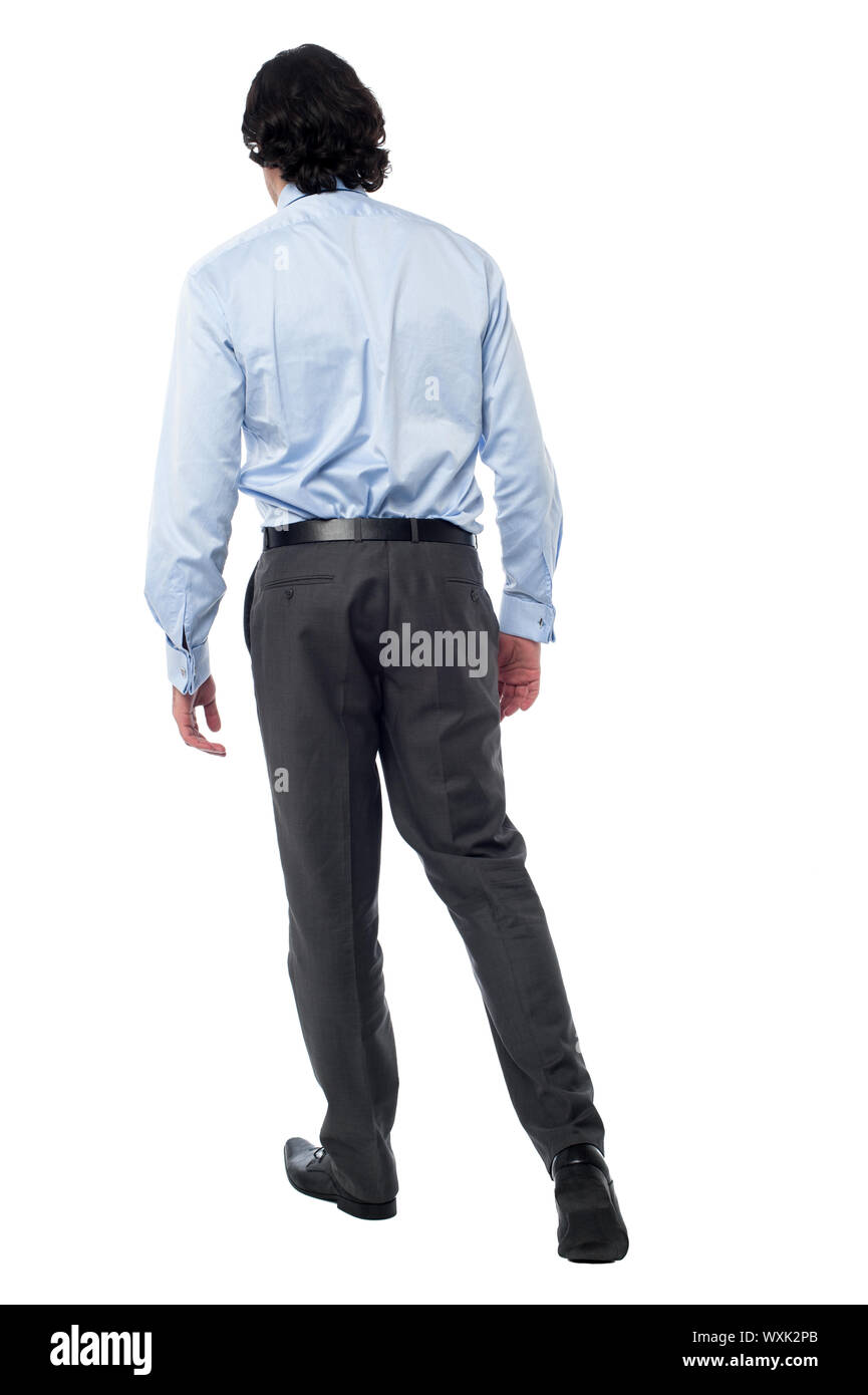 Back shot young man walking hi-res stock photography and images - Alamy