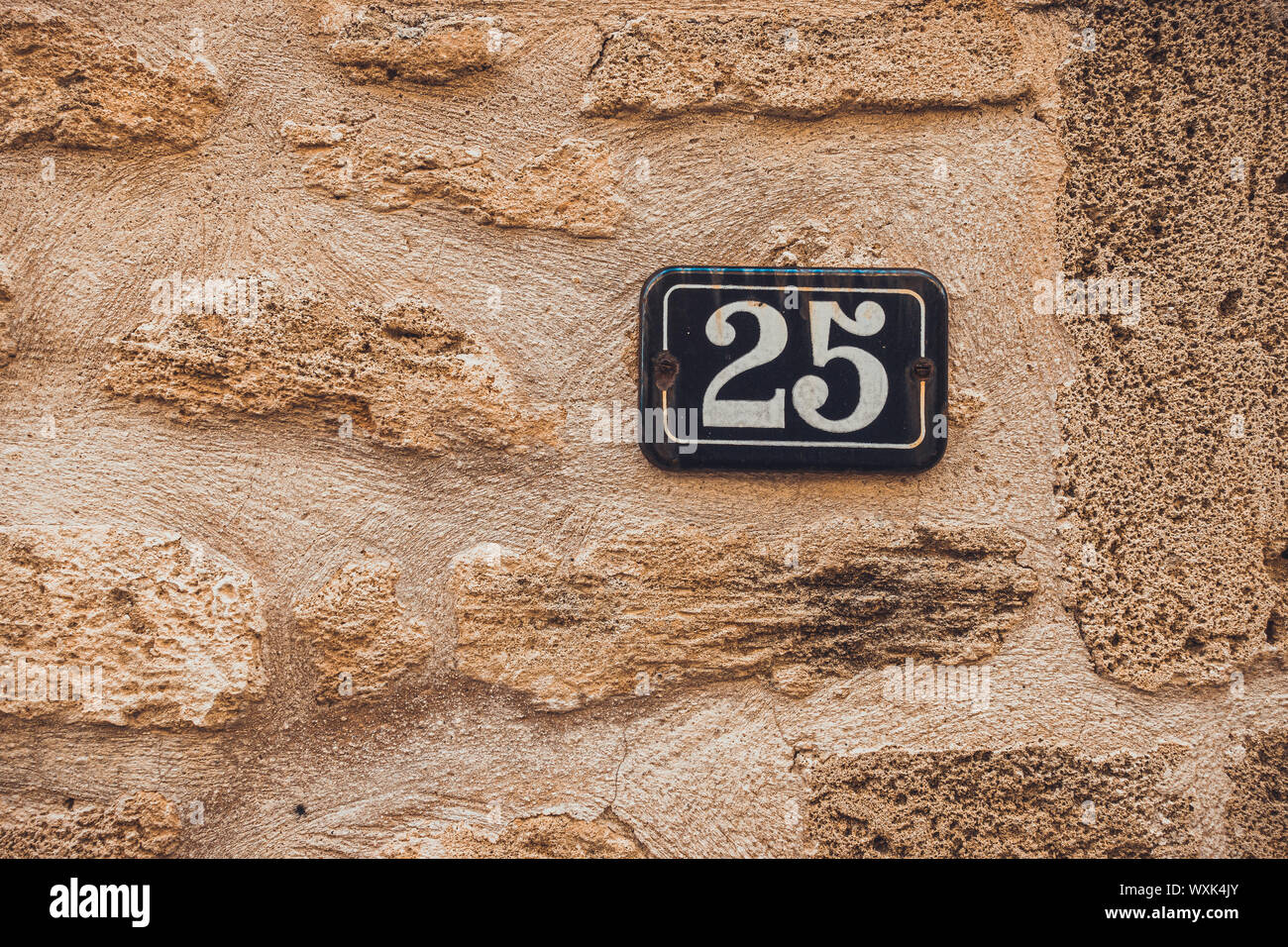 number 25 door sign at majorca Stock Photo - Alamy