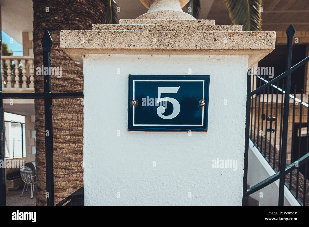number 5 door sign on a tile Stock Photo - Alamy