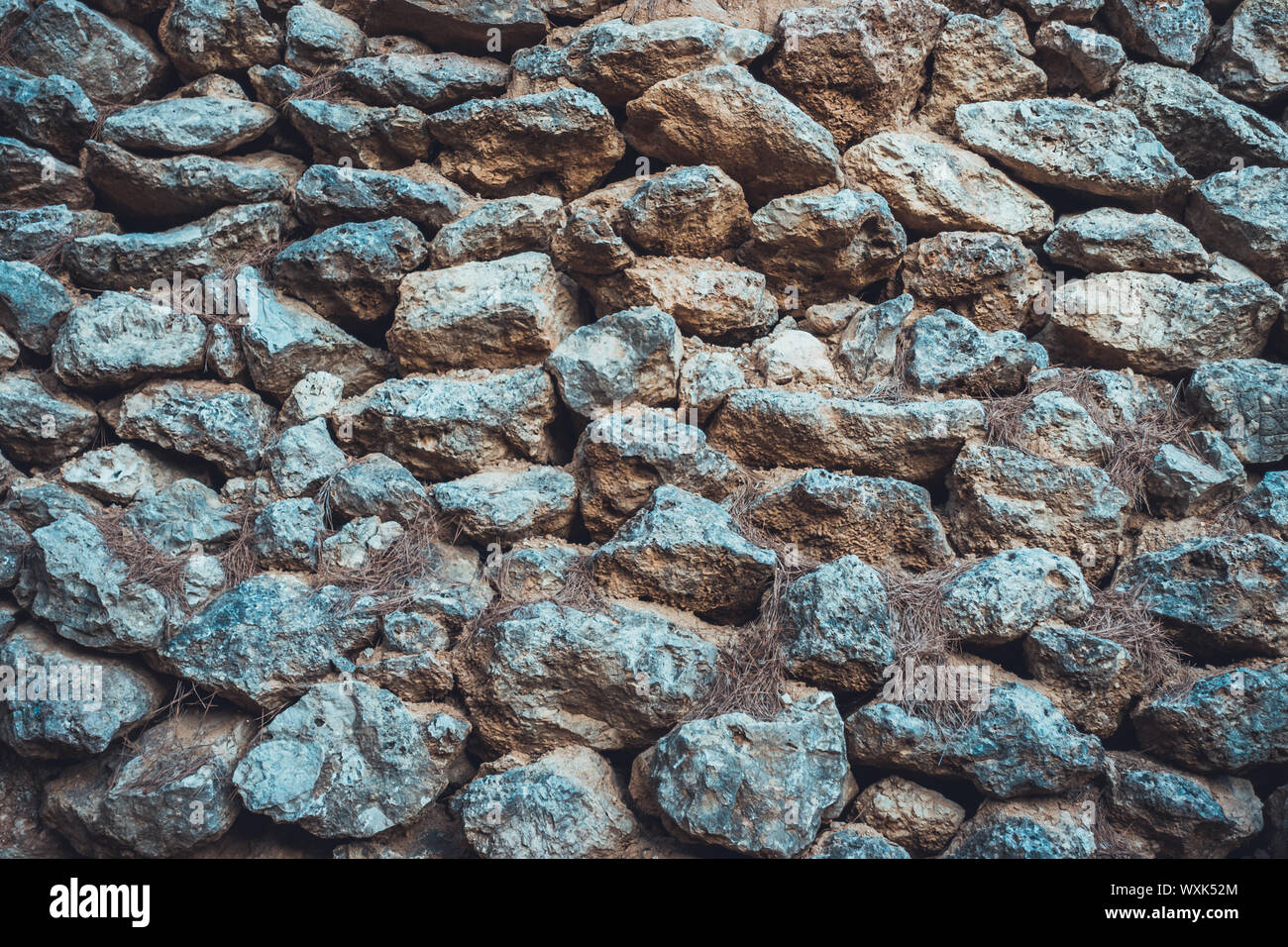 structured background stone texture in warm colors Stock Photo - Alamy
