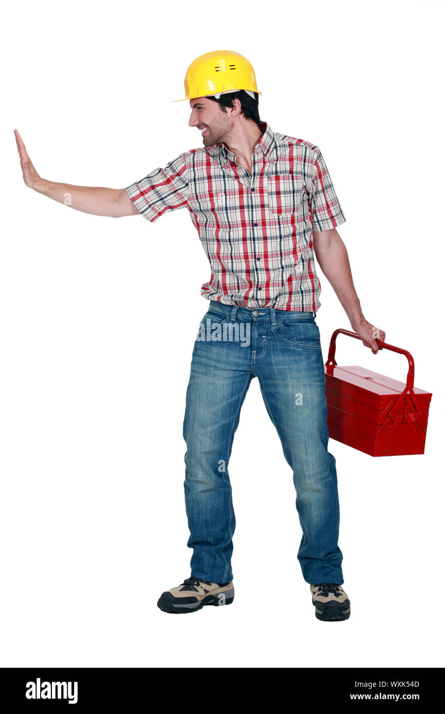 craftsman pushing something Stock Photo - Alamy