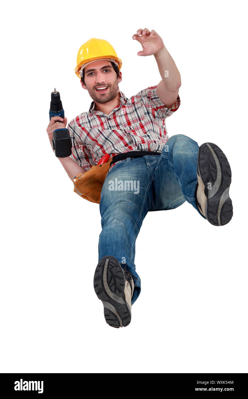 A falling construction worker Stock Photo - Alamy