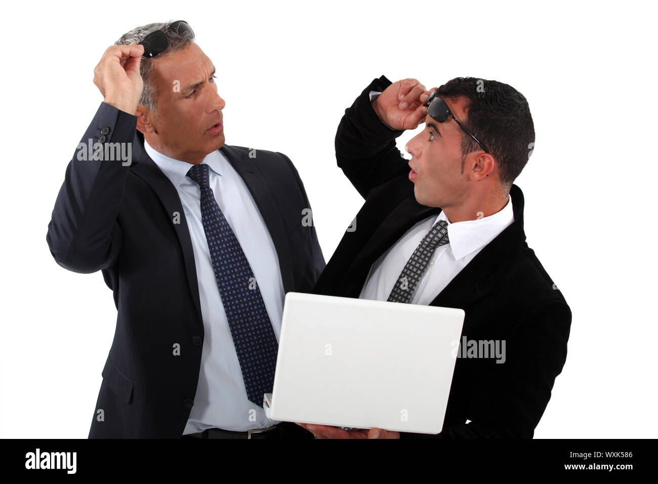 Businessmen recognizing one another Stock Photo - Alamy