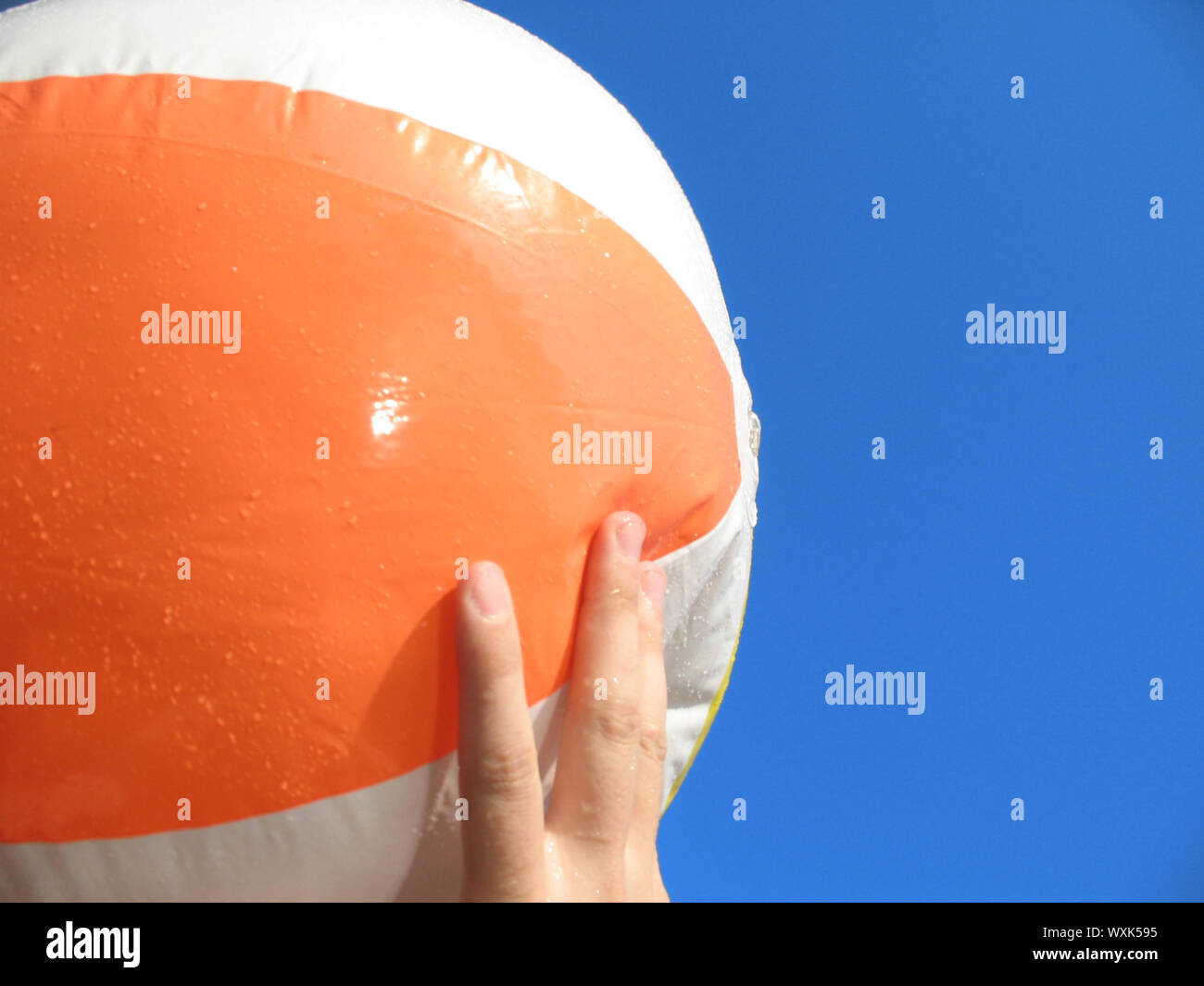 Caught wet ball Stock Photo - Alamy