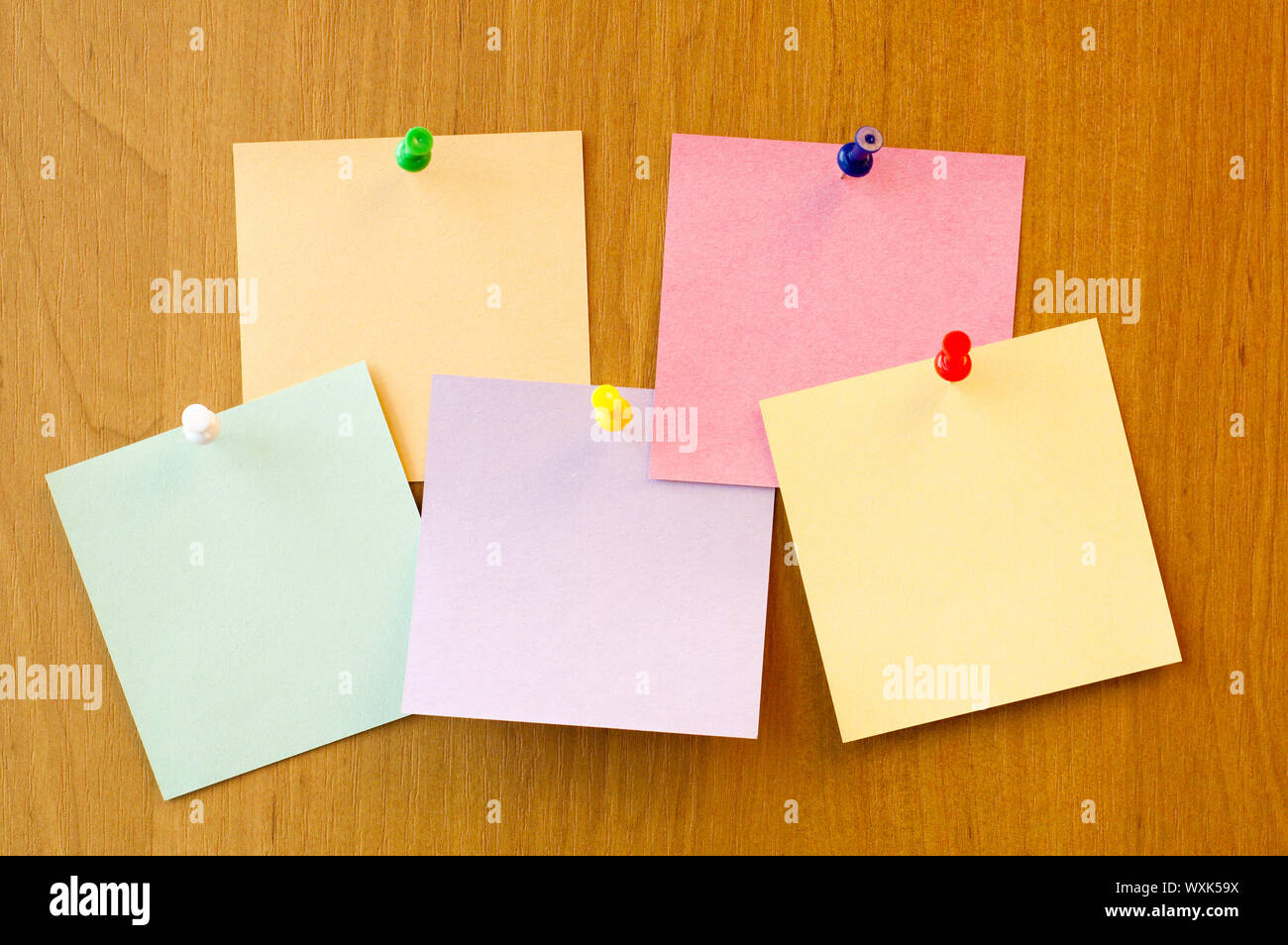 colored notes paper with pins Stock Photo - Alamy