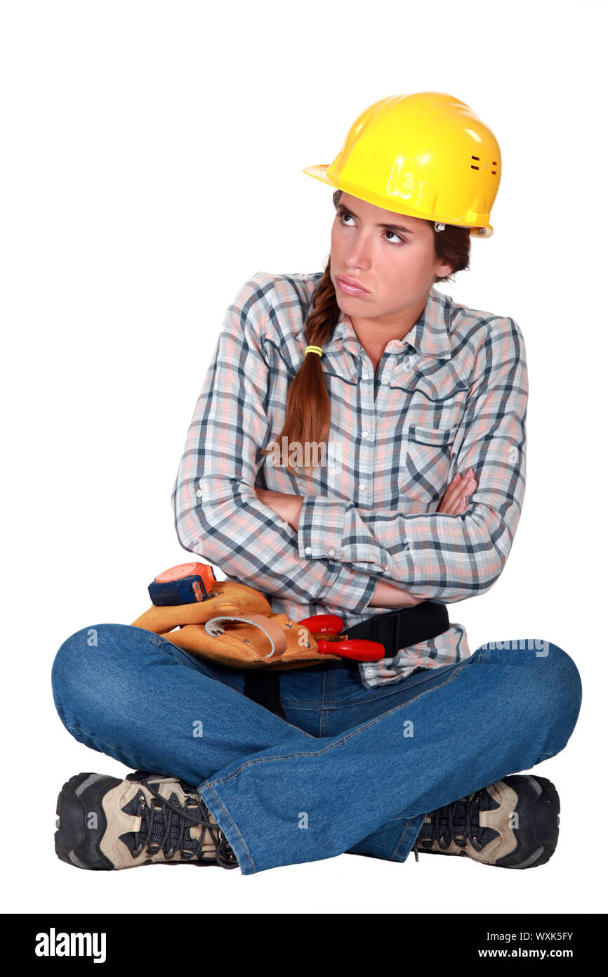Female laborer blowing Stock Photo - Alamy