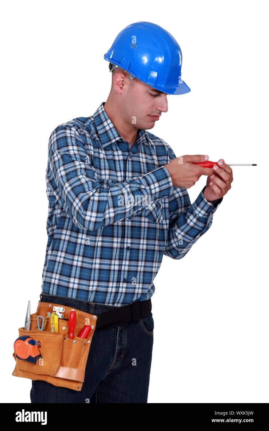 A handyman with a screwdriver Stock Photo - Alamy