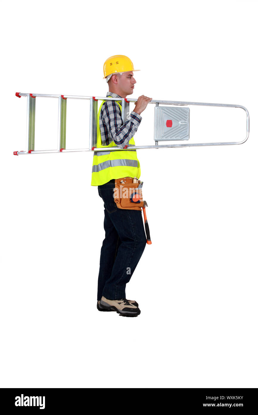 A handyman carrying a ladder Stock Photo - Alamy