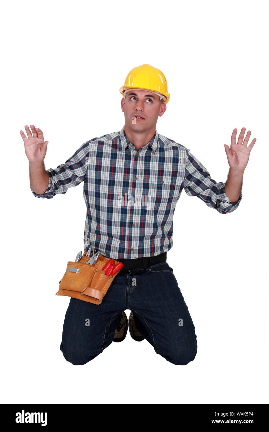 A male construction worker trapped in an invisible box Stock Photo - Alamy