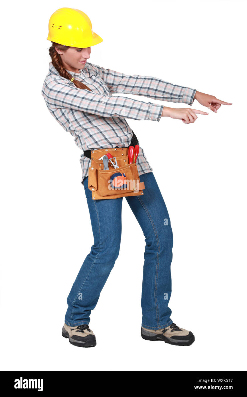 Female construction worker pointing with both hands Stock Photo - Alamy