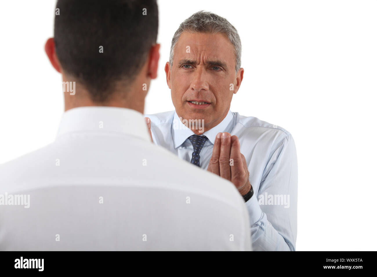 Boss dissatisfied with employee Stock Photo - Alamy