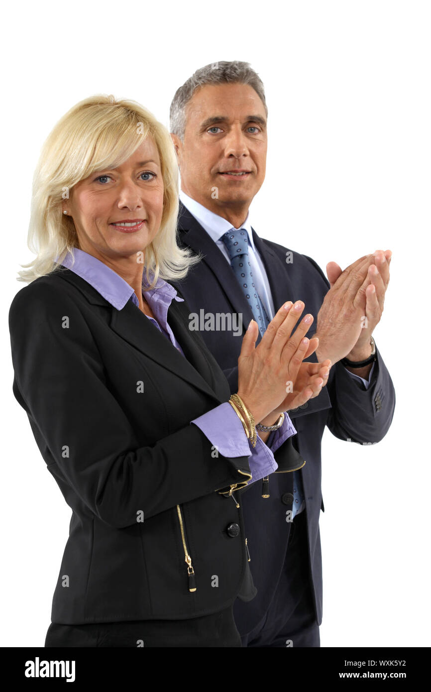 Business professionals clapping their hands Stock Photo - Alamy