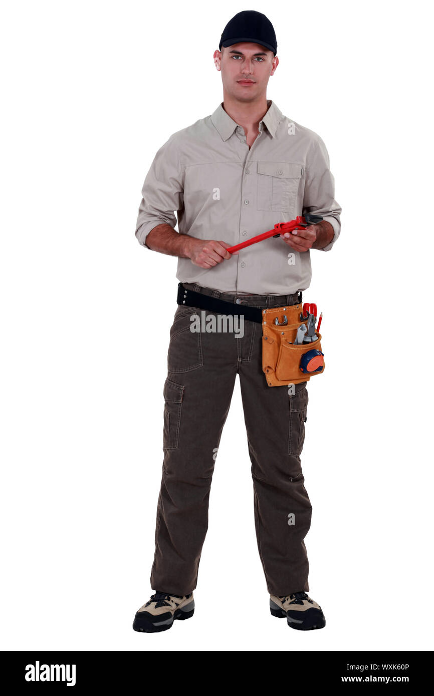A handyman with a wrench Stock Photo - Alamy